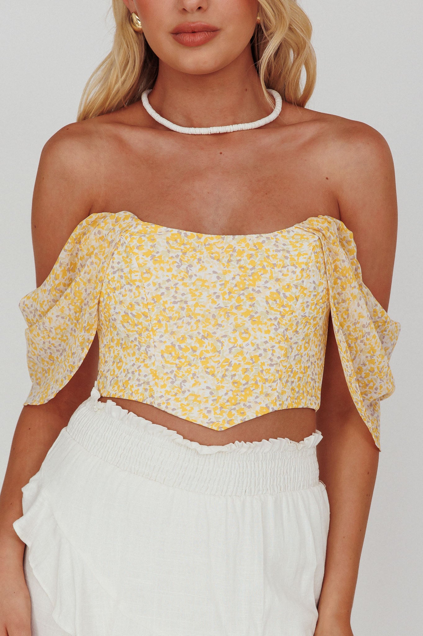 Shop the Brandy Off-Shoulder Pointed Hem Crop Top Mottled Print Yellow